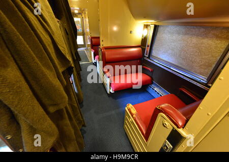 The seats inside of a vintage American railway carriage Stock Photo - Alamy