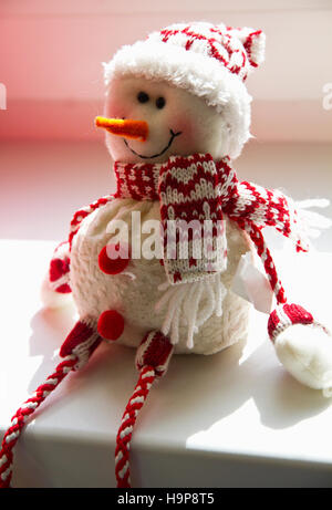 a white snowman in winter, symbol for holidays and vacation fun a white ...