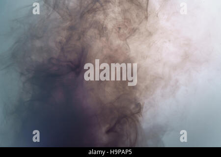 acrylic pink color in muddy water Stock Photo - Alamy