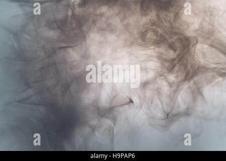 acrylic pink color in muddy water Stock Photo - Alamy