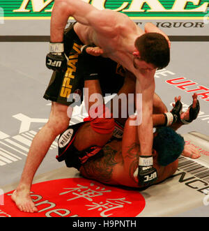 Dustin Hazelett, left, fights Diego Saraieva at the Ultimate Fighting ...