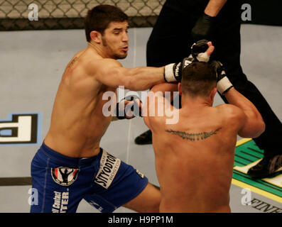 Patrick Cote, left, fights Scott Smith at the Ultimate Fighting ...