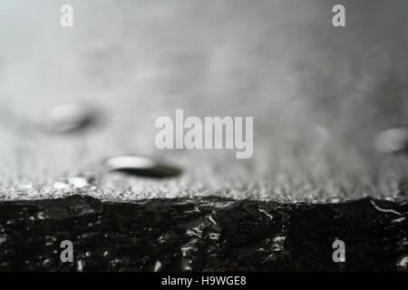 slate surface with water drops macro shot Stock Photo - Alamy