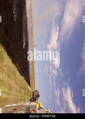 This image captures a prescribed burn conducted in Badlands National ...