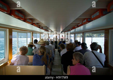 A Park Ranger leads a boat tour on Glacier National Park's pristine ...