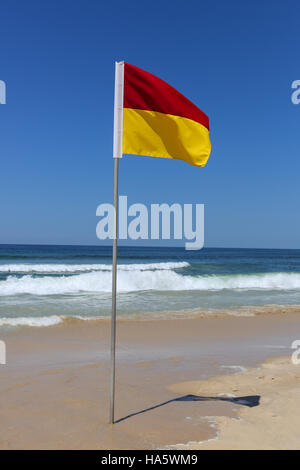 Beach at Surfers Paradise flying the red and yellow flag that signifies ...