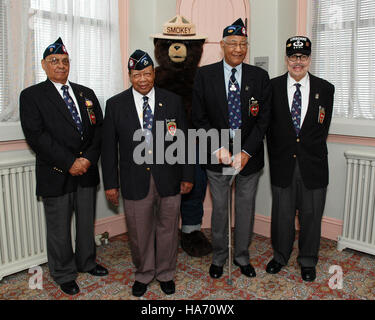 Smokejumpers are trained to parachute into remote areas, like ...