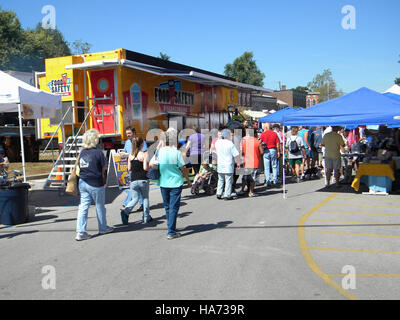 At the Midway Fall Festival, the FSIS Food Safety booth offers visitors ...