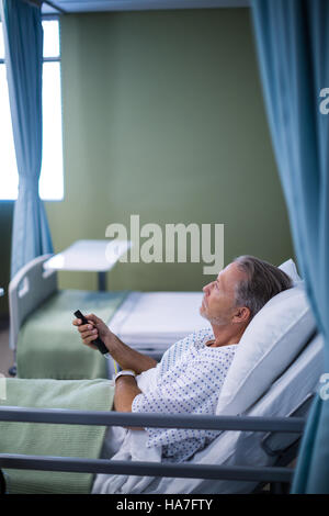 TV remote control on hospital bed Stock Photo - Alamy