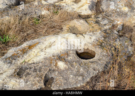Native American Indian acorn grinding holes mortar stones in bedrock at ...