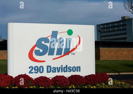 A logo sign outside of the headquarters of SHI International Corp., in ...