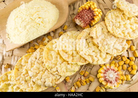 circle shaped corn snacks and corn kernels Stock Photo - Alamy