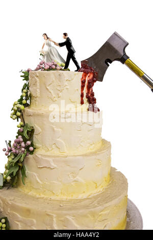 Wedding cake chopped with axe Stock Photo - Alamy