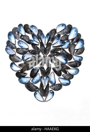 heart made with shells. Heart shape on sand Stock Photo - Alamy