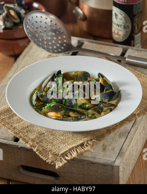 Mussels in Guinness Cream Sauce Stock Photo - Alamy