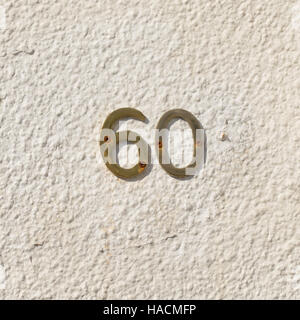 House Number 60 sign on wall Stock Photo - Alamy