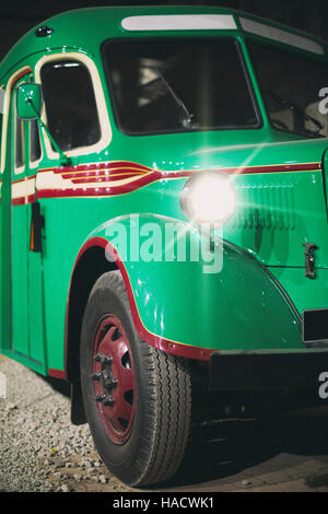 Part of green retro bus with passenger seats Stock Photo - Alamy