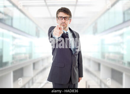mad business man pointing, at the office Stock Photo - Alamy