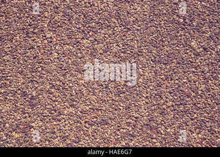 Color toned grit in asphalt, background or texture Stock Photo - Alamy