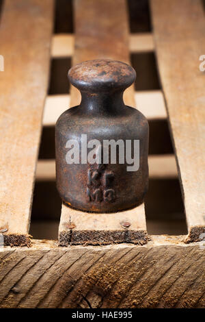 one kilogram - old and rusty balance weight Stock Photo - Alamy