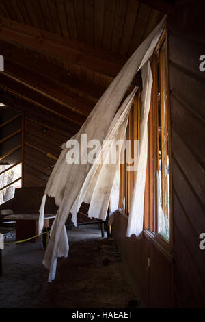 old ripped white curtains Stock Photo - Alamy