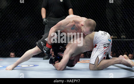 Gray Maynard, left, fights Jim Miller during UFC 96 at the Nationwide ...