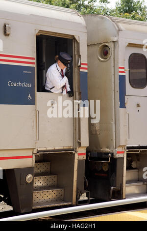 Amtrak railroad conductor Stock Photo - Alamy