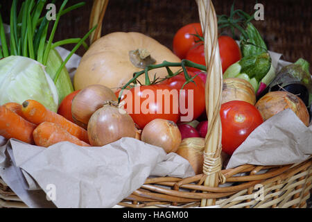 Different kinds of vegetables picked in the harvest basket Stock Photo ...