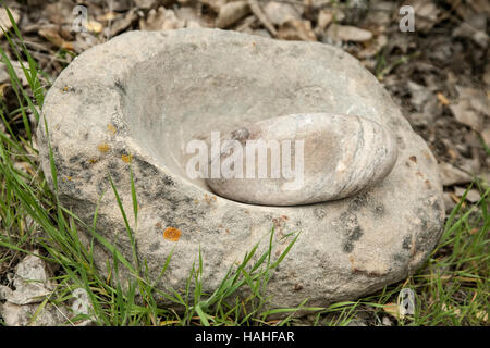 Native American Indian mortar and pestle used to grind corn Stock Photo ...