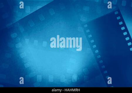 Film negative frames on blue background Stock Photo - Alamy