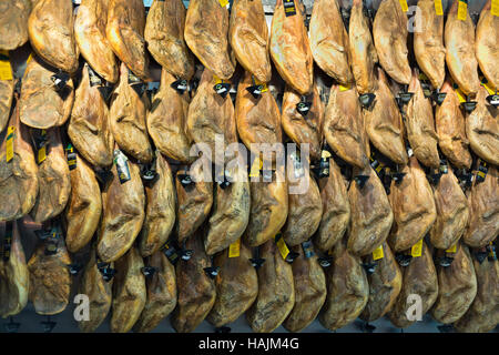 Pork foot jamon in underground storage Stock Photo - Alamy