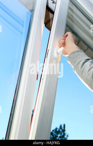 Open window with blue sky. PVC plastic Stock Photo - Alamy