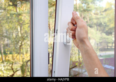 hand open window to get some fresh air inside the room Stock Photo - Alamy