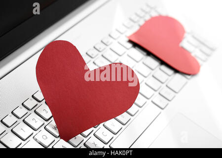 Love emotion - online dating concept. Heart on the keyboard, top view ...