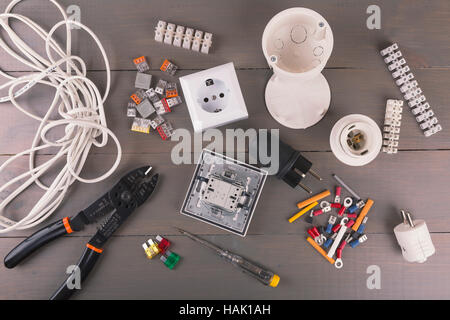 Electrical cable tester on wooden board Stock Photo - Alamy