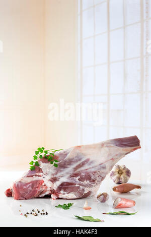 Fresh raw lamb leg isolated on white background Stock Photo - Alamy