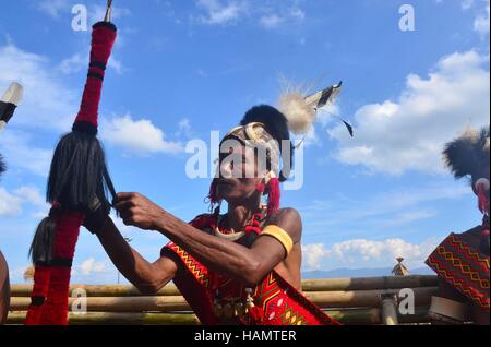 Kisama, India. 02nd Dec, 2016. Artist from Manipur state perform a ...