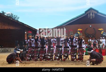 Kisama, India. 02nd Dec, 2016. Artist from Manipur state perform a ...