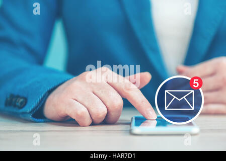 Business woman using smartphone sms Stock Photo - Alamy
