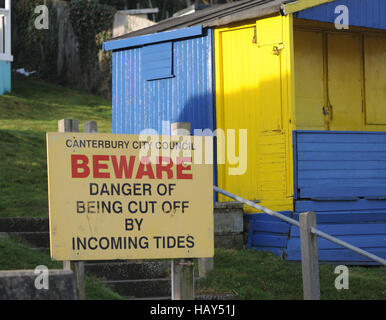 Warning sign for incoming tides Stock Photo - Alamy
