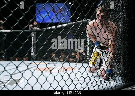 UFC fighter Dan Lauzon doubles in pain after being kicked in the groin ...