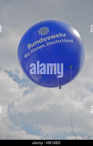 Logo of the German Bundeswehr (armed forces) on a heap on a table. Web ...