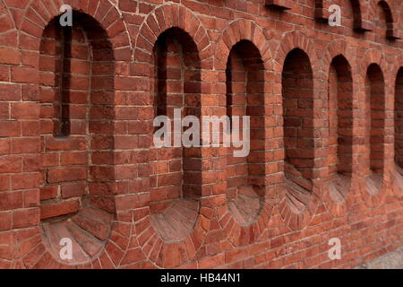 The wall of the old fortress with loopholes Stock Photo - Alamy