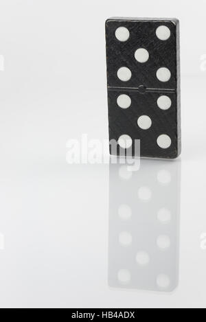 Composition of standing black domino bricks with white dots Stock Photo ...
