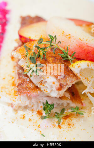 Sea bream orata fillet butter pan fried with fresh peach prune and ...