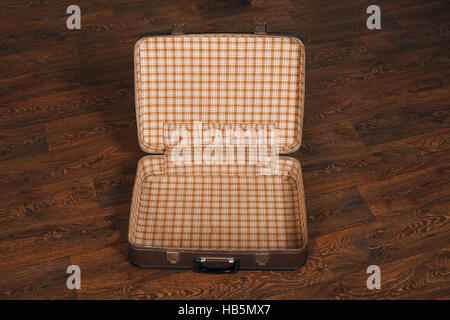 Open empty suitcase on floor indoors, top view. Space for text Stock ...