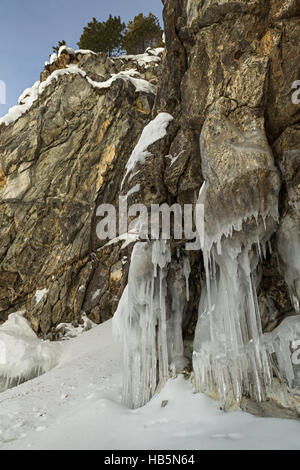 Beautiful icicles on rocks Stock Photo - Alamy