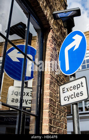 Turn right ahead road sign, blue round isolated roadside traffic ...