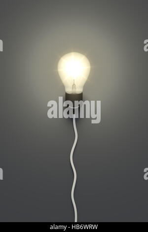 light bulb on dark black background Stock Photo - Alamy