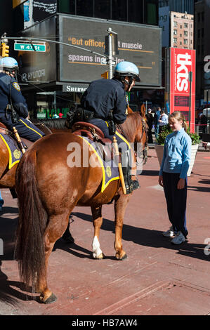 Female police officer riding horse Montreal Canada Stock Photo - Alamy